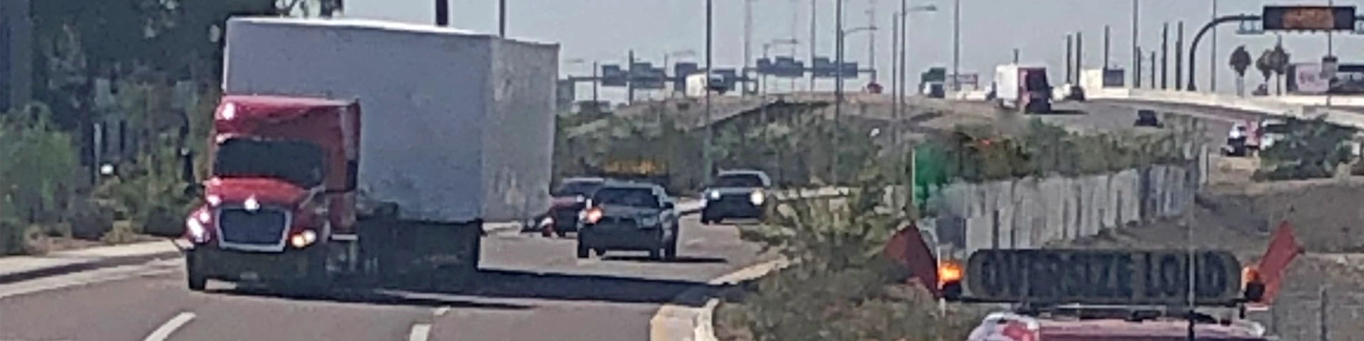 Oversized load with escort